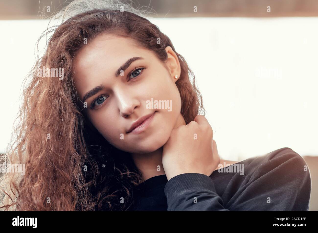 Beautiful girl hairstyle curls hi-res stock photography and images - Alamy