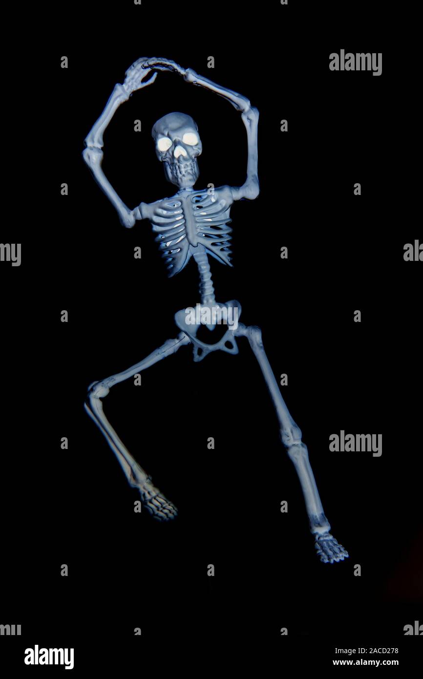 Silly dancing skeleton as seen through an xray machine Stock Photo - Alamy
