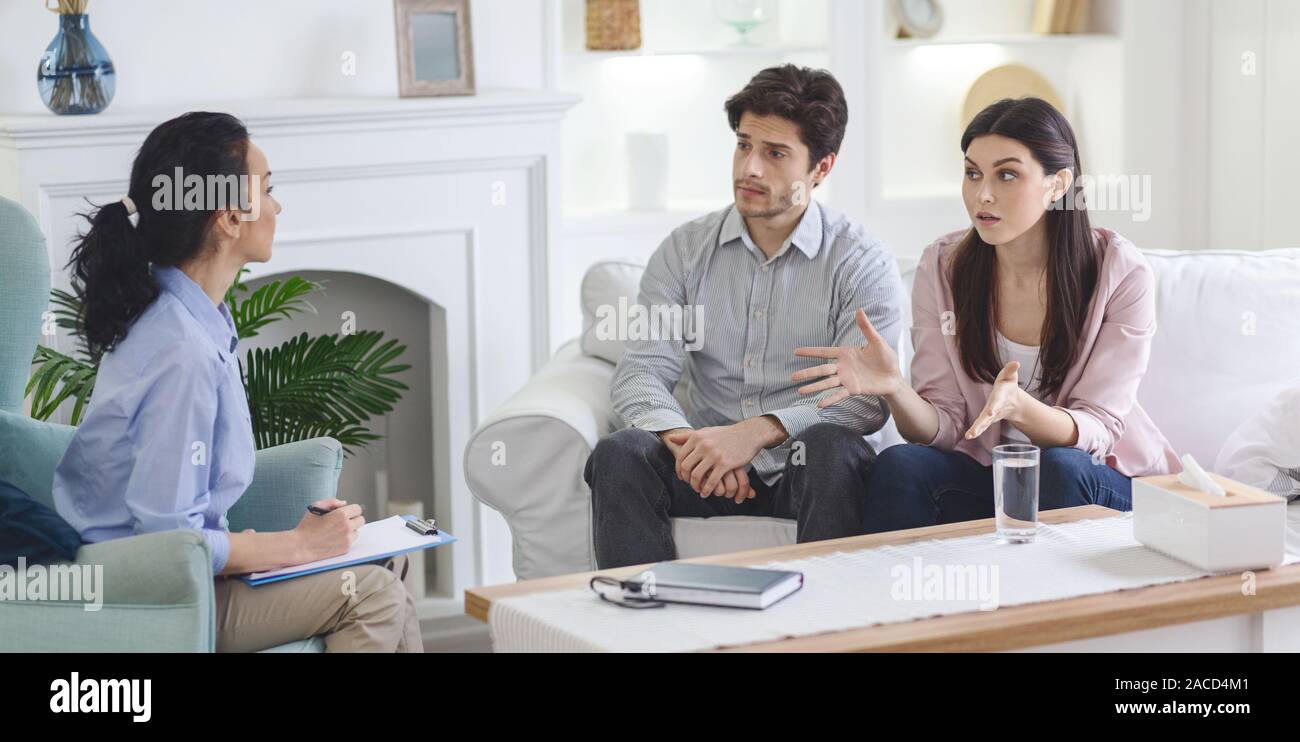 Angry wife expressing her feelings at family therapy Stock Photo - Alamy