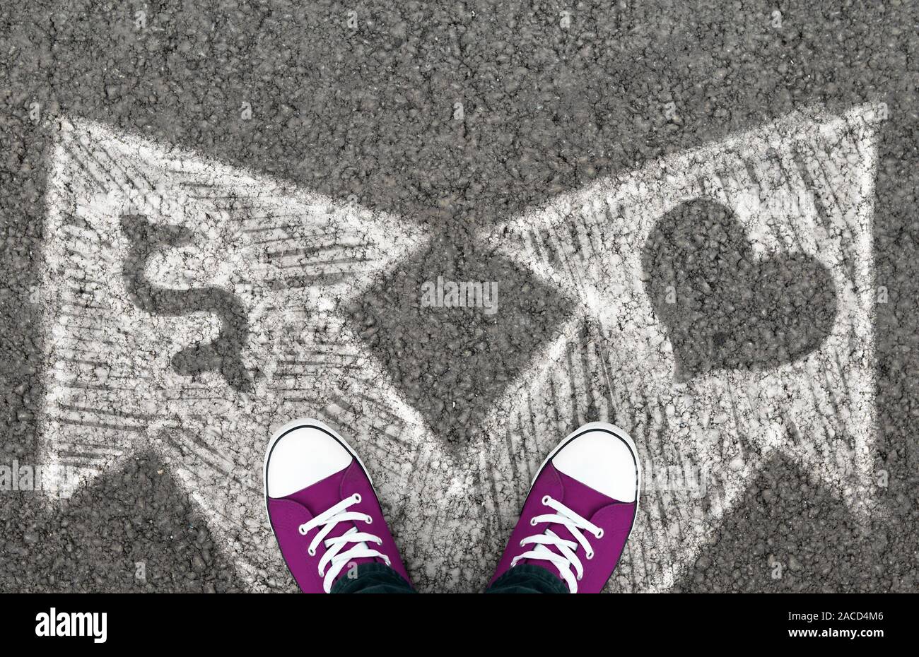 Money versus love, choice between weath and warmth Stock Photo - Alamy