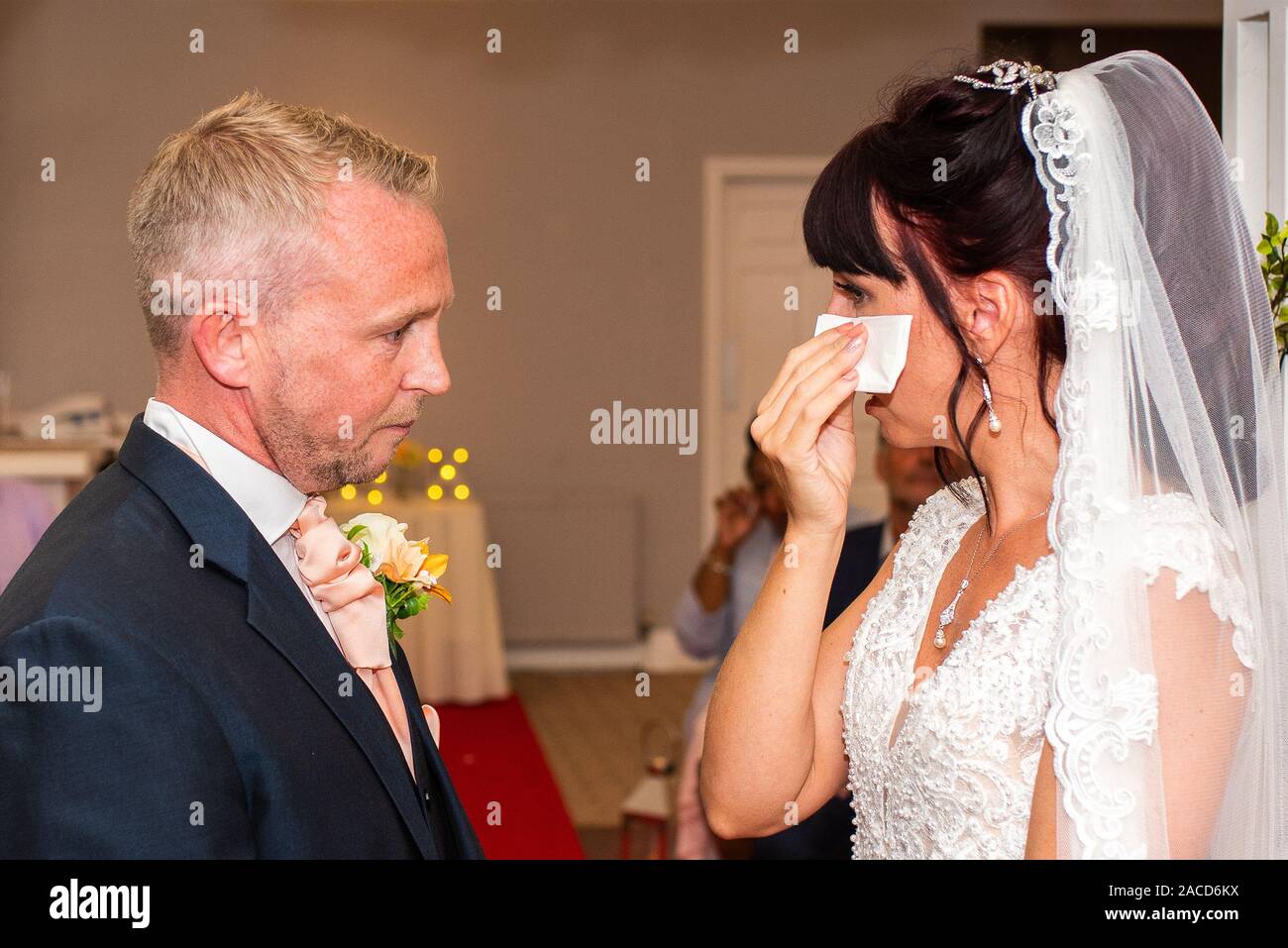Bride crying during ceremony hi-res stock photography and images - Alamy