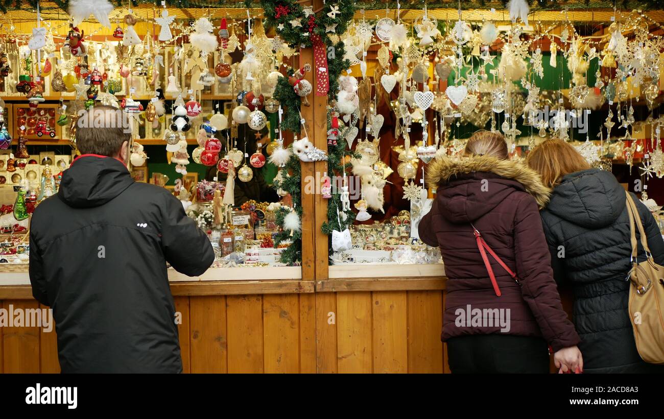 Christmas market stall with tree decorated ornaments products star ...