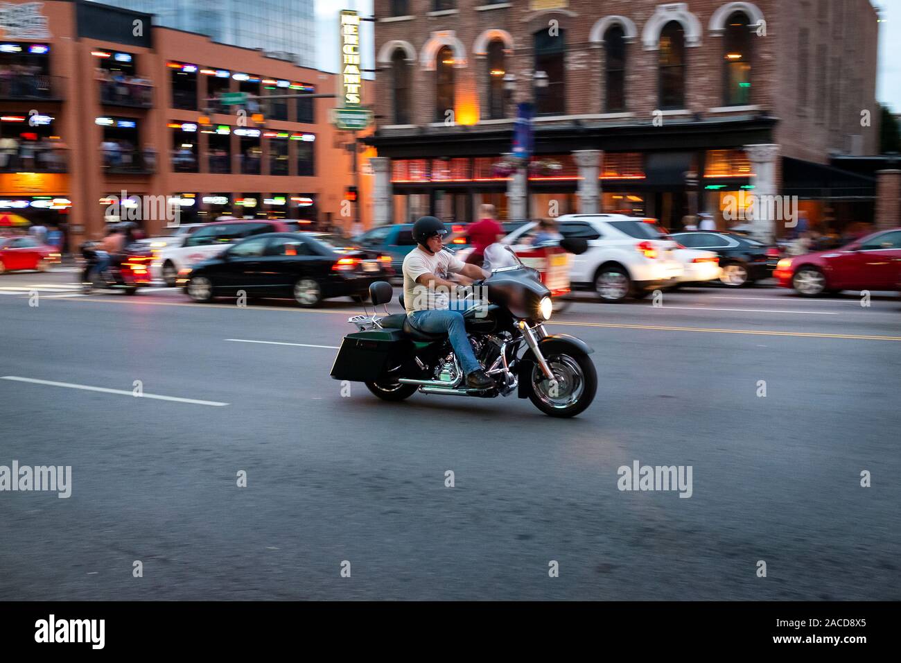 Nashville, Tennessee, USA - June 28, 2014: A man riding a motorcycle ...