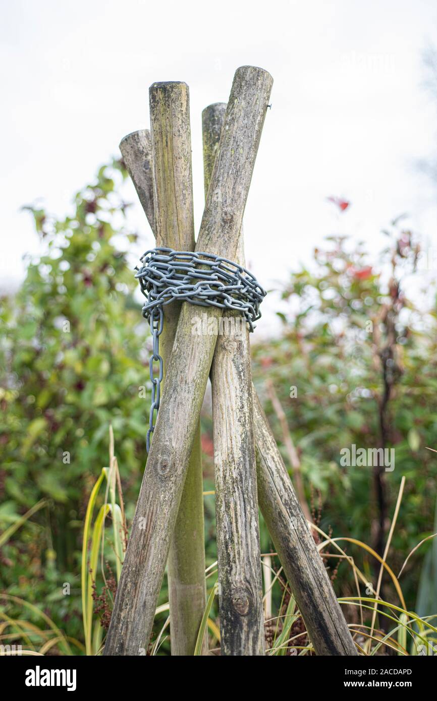Garden Structure, wooden four post structure with chains wrapped around ...