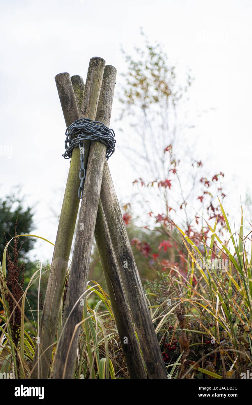 Garden Structure, wooden four post structure with chains wrapped around ...
