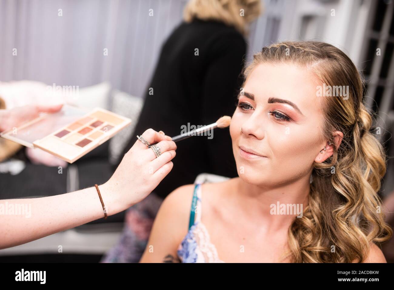 Female getting hair done in salon hi-res stock photography and images ...