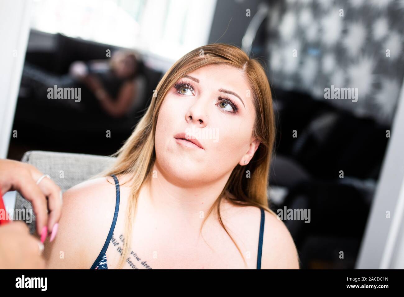 A gorgeous bride getting ready for her special day, bridal preparation ...