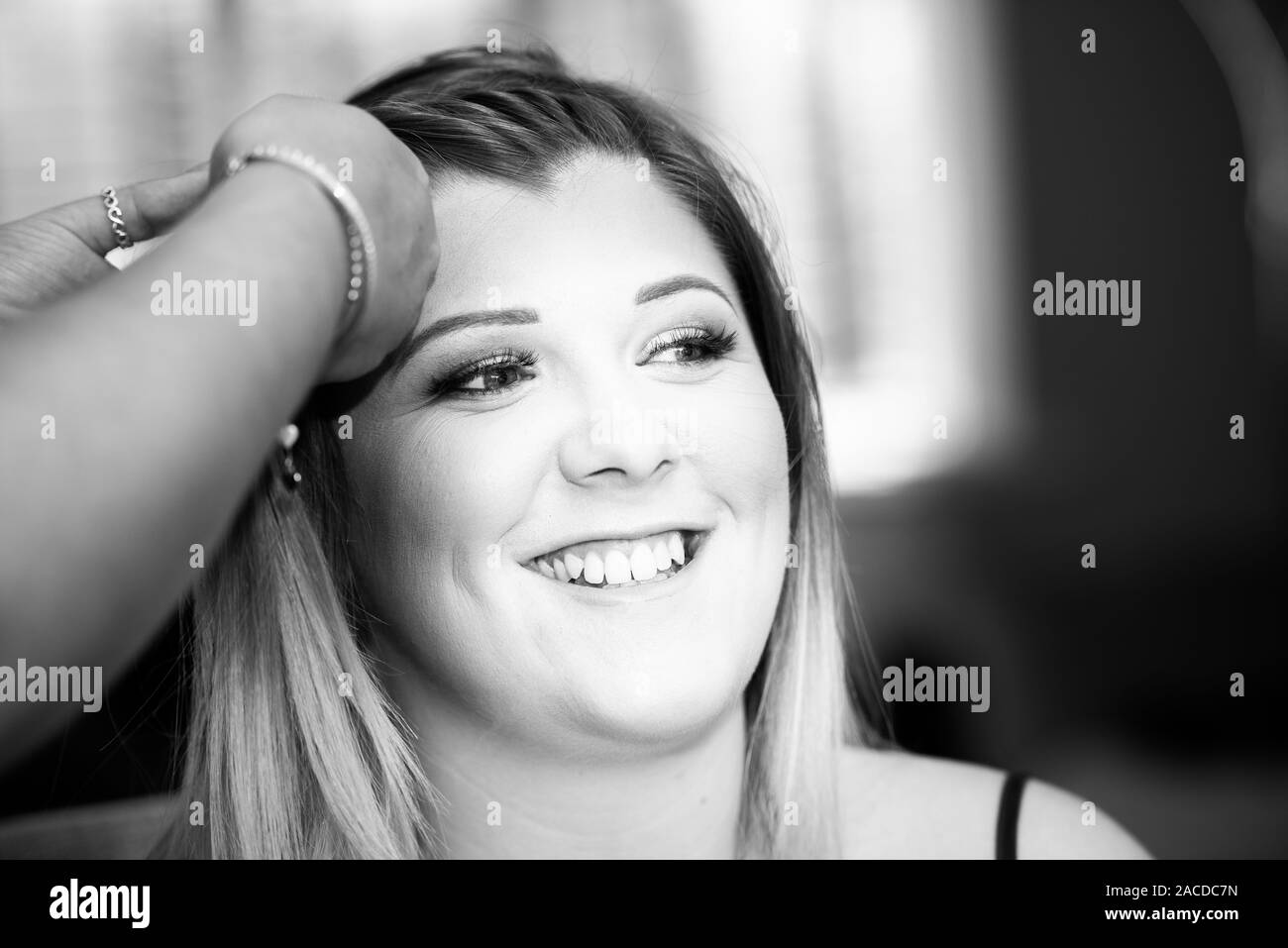 A gorgeous bride getting ready for her special day, bridal preparation ...