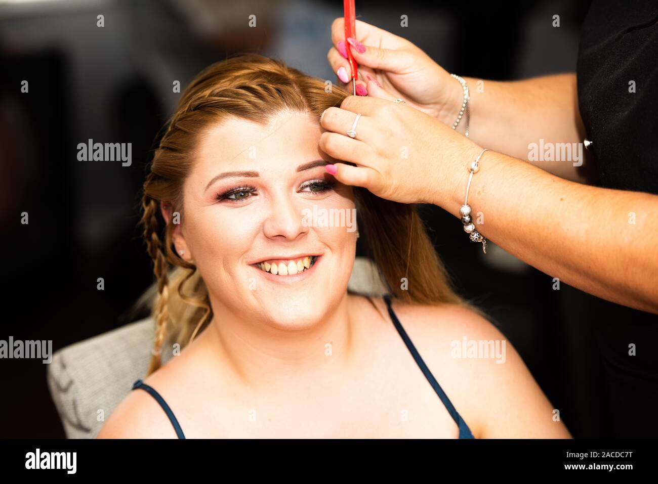A gorgeous bride getting ready for her special day, bridal preparation ...