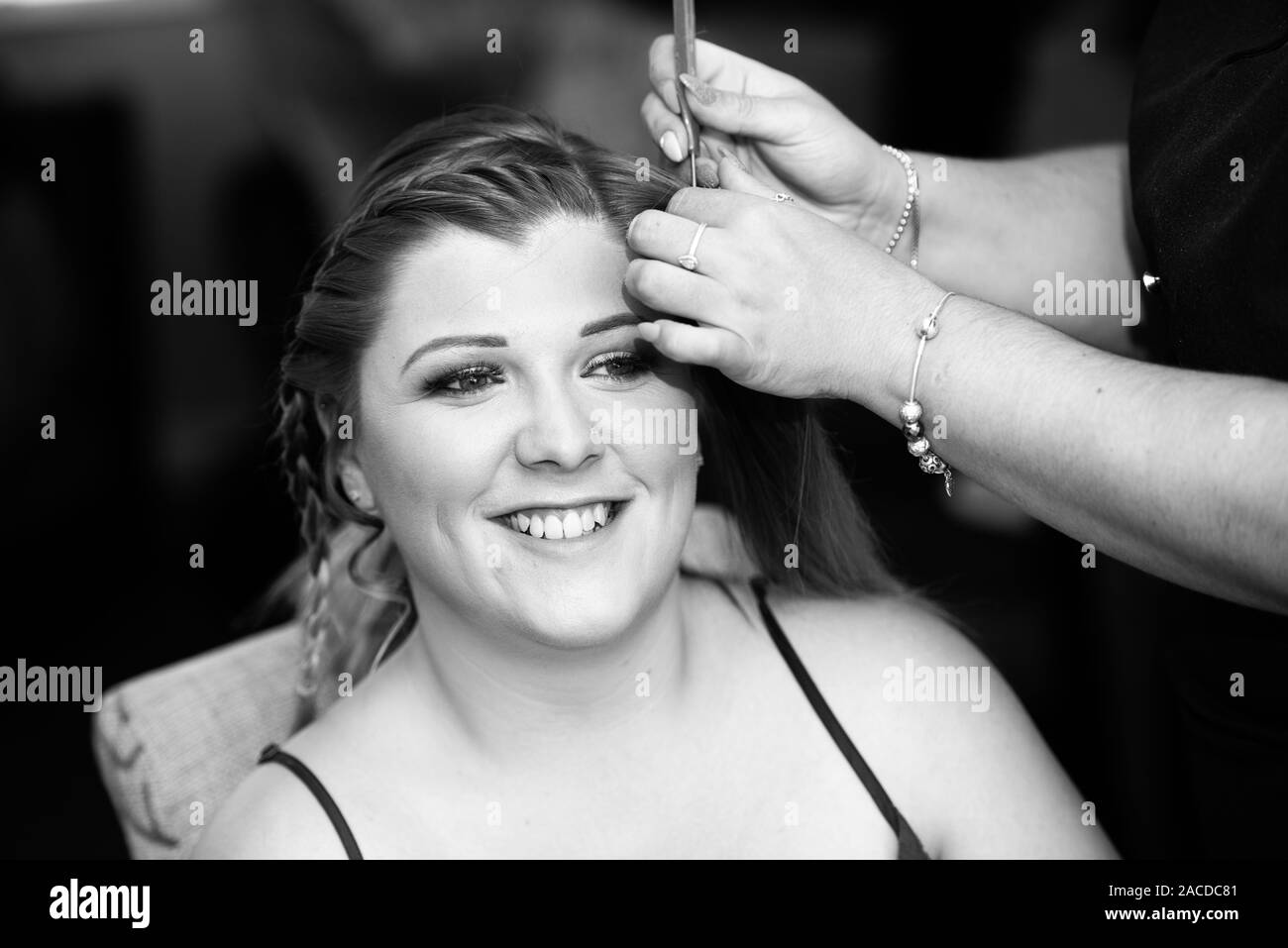 Girl getting her hair done hi-res stock photography and images - Alamy