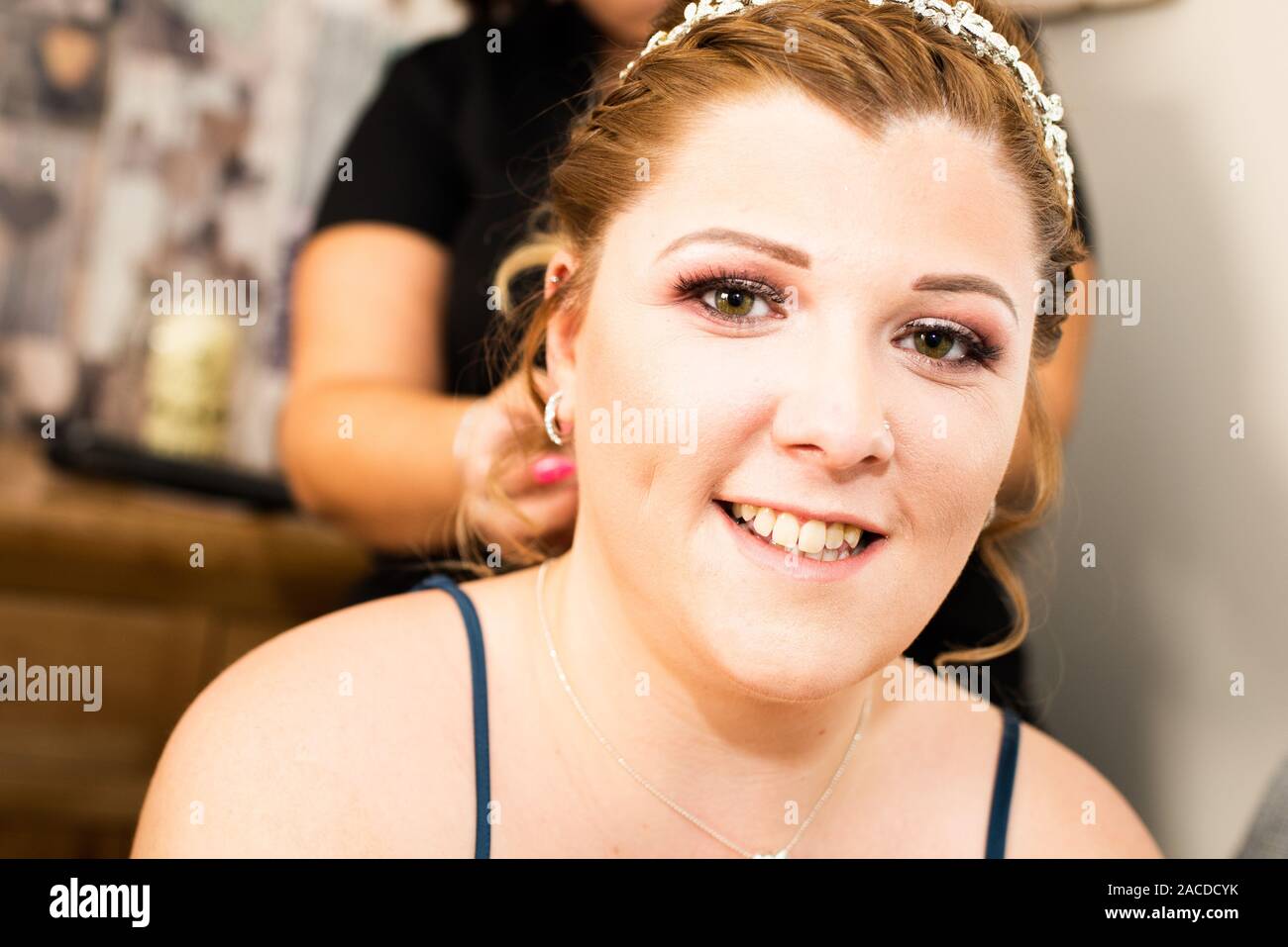 A gorgeous bride getting ready for her special day, bridal preparation ...