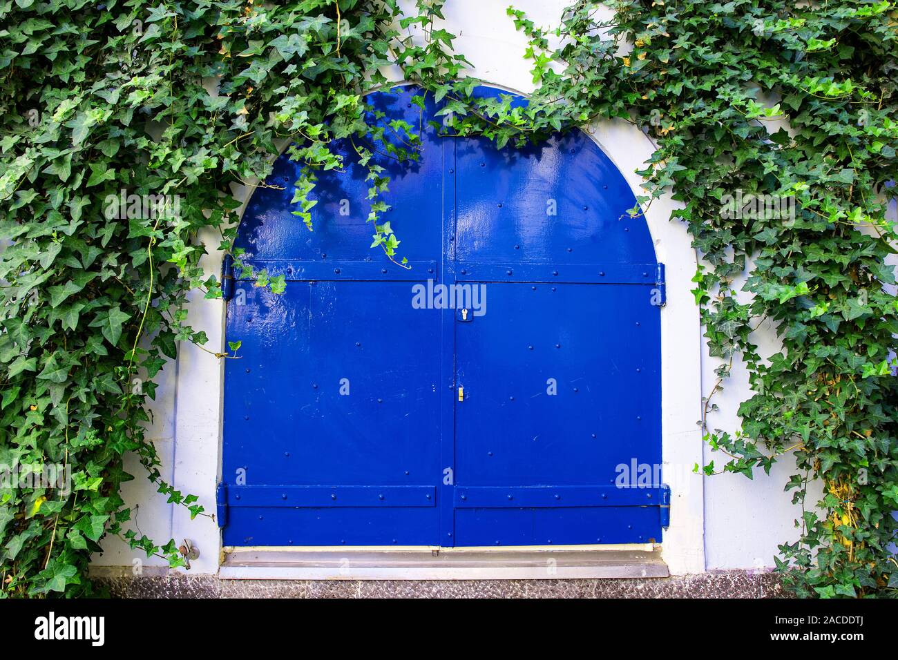 Closed blue window Stock Photo - Alamy