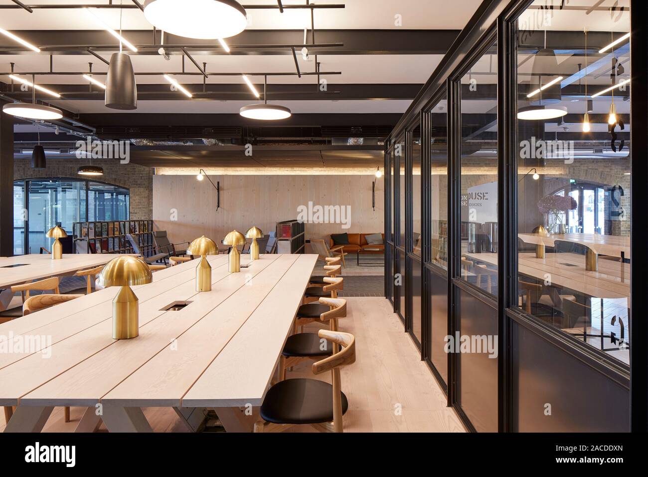 Informal meeting areas with communal tables. Devon House, London ...