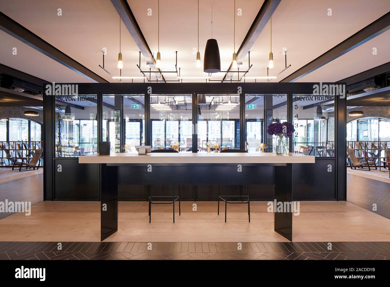 Informal meeting areas with communal tables. Devon House, London ...