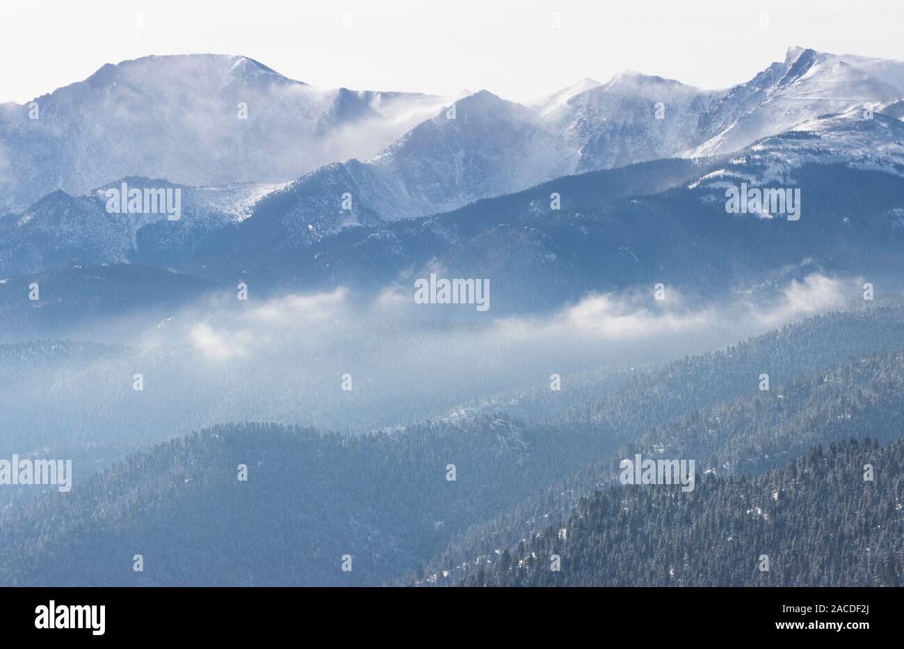 Clouds and haze after a huge Colorado winter storm on Pikes Peak Stock ...