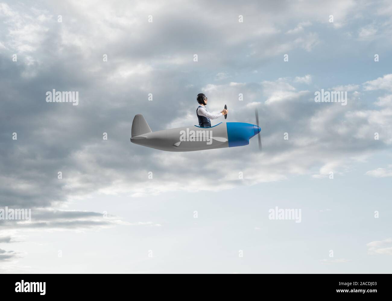 Happy pilot driving small propeller plane Stock Photo - Alamy