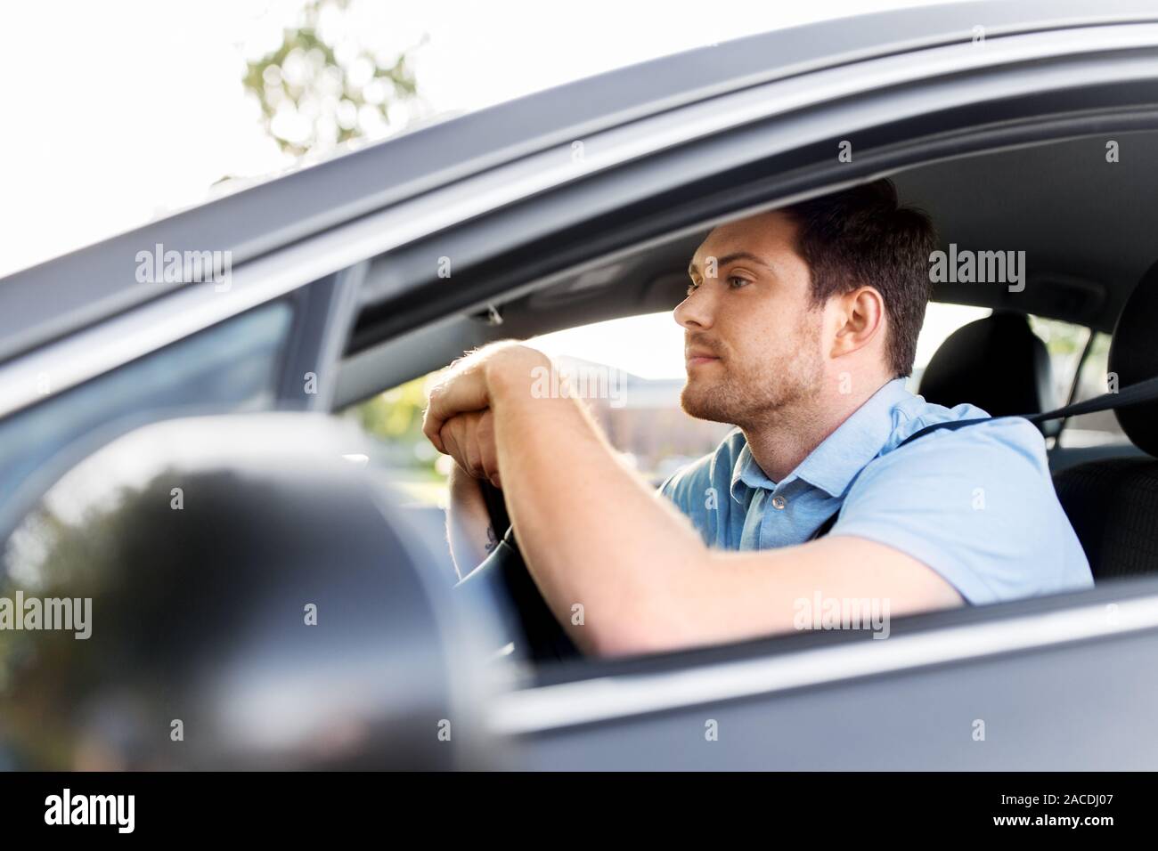 man or driver driving car in summer Stock Photo - Alamy