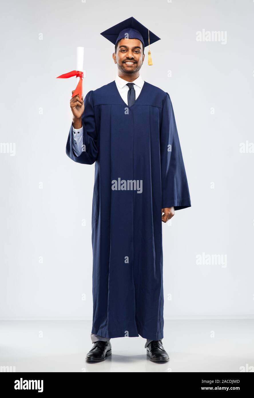 graduate student in mortar board with diploma Stock Photo - Alamy