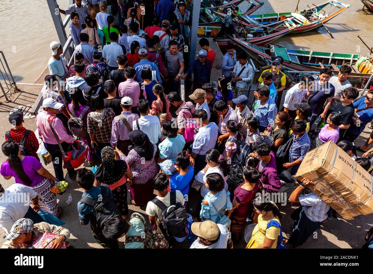 Passengers Board The Dalah Ferry (Dala Ferry) Pansodan Ferry Terminal ...