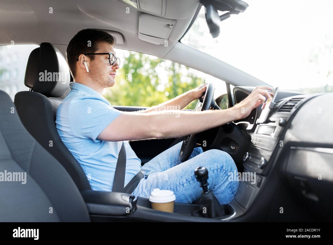 Man driving car using navigator hi-res stock photography and images - Alamy