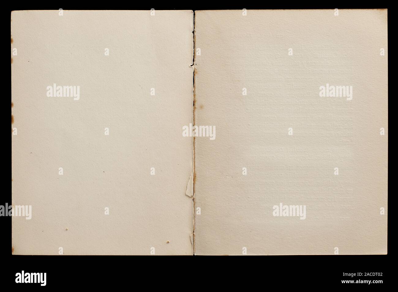 Antique book unfolded showing textured pages isolated on black ...