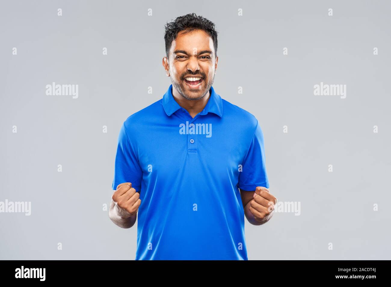 happy indian man celebrating victory Stock Photo - Alamy