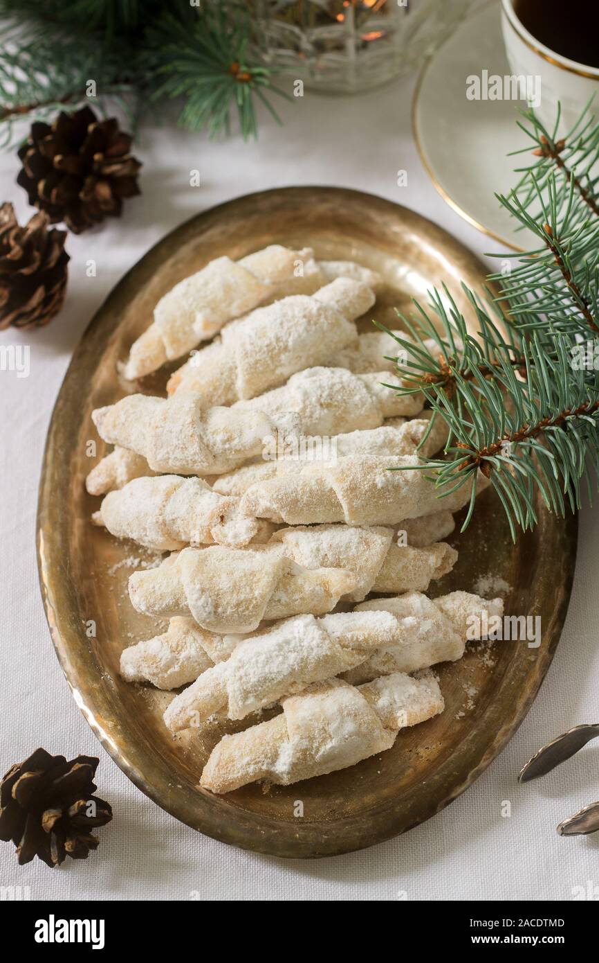 Traditional Moldavian shortcake cookies with jam stuffing and a cup of ...