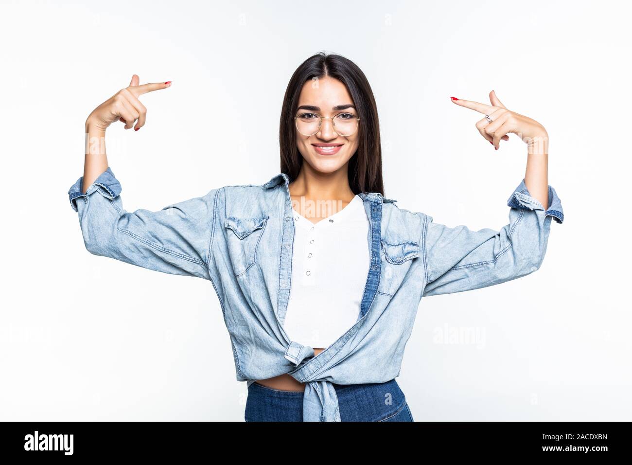 Young woman pointing herself isolated on white background Stock Photo ...