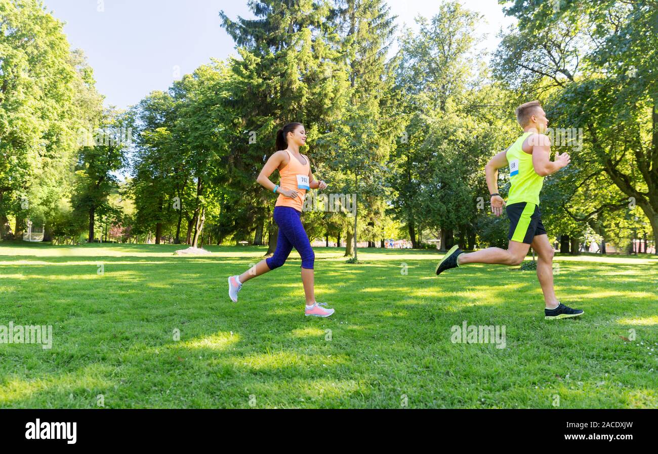 Happy friends couple racing hi-res stock photography and images - Alamy