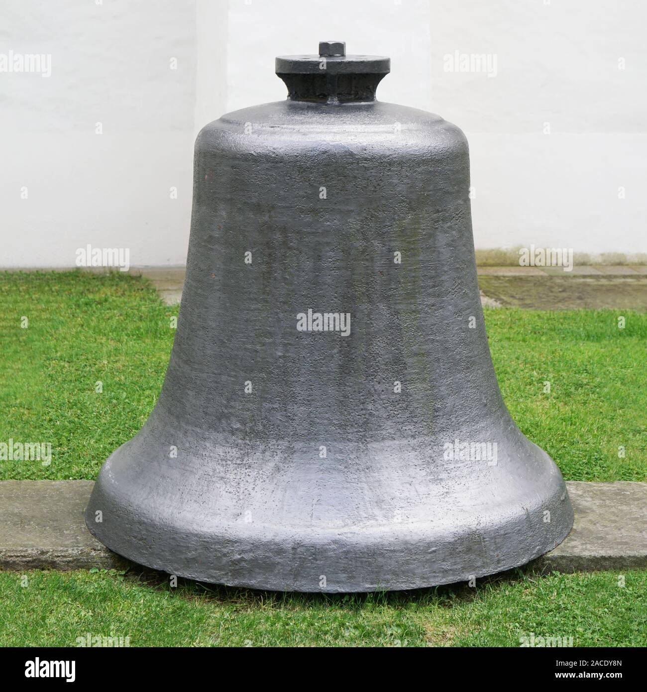 obsolete old vintage cast iron church bell Stock Photo - Alamy