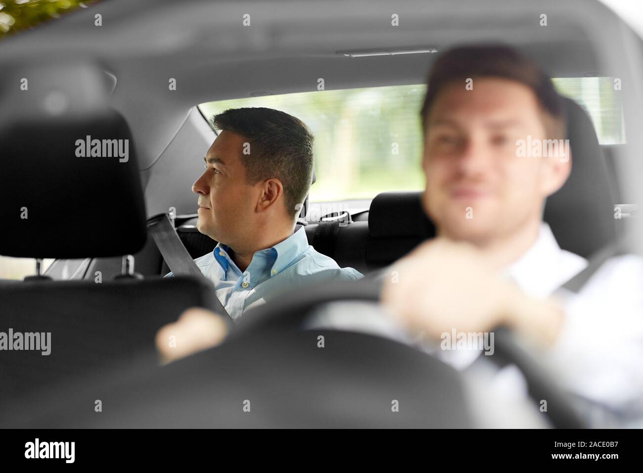 middle aged male passenger and car driver Stock Photo - Alamy