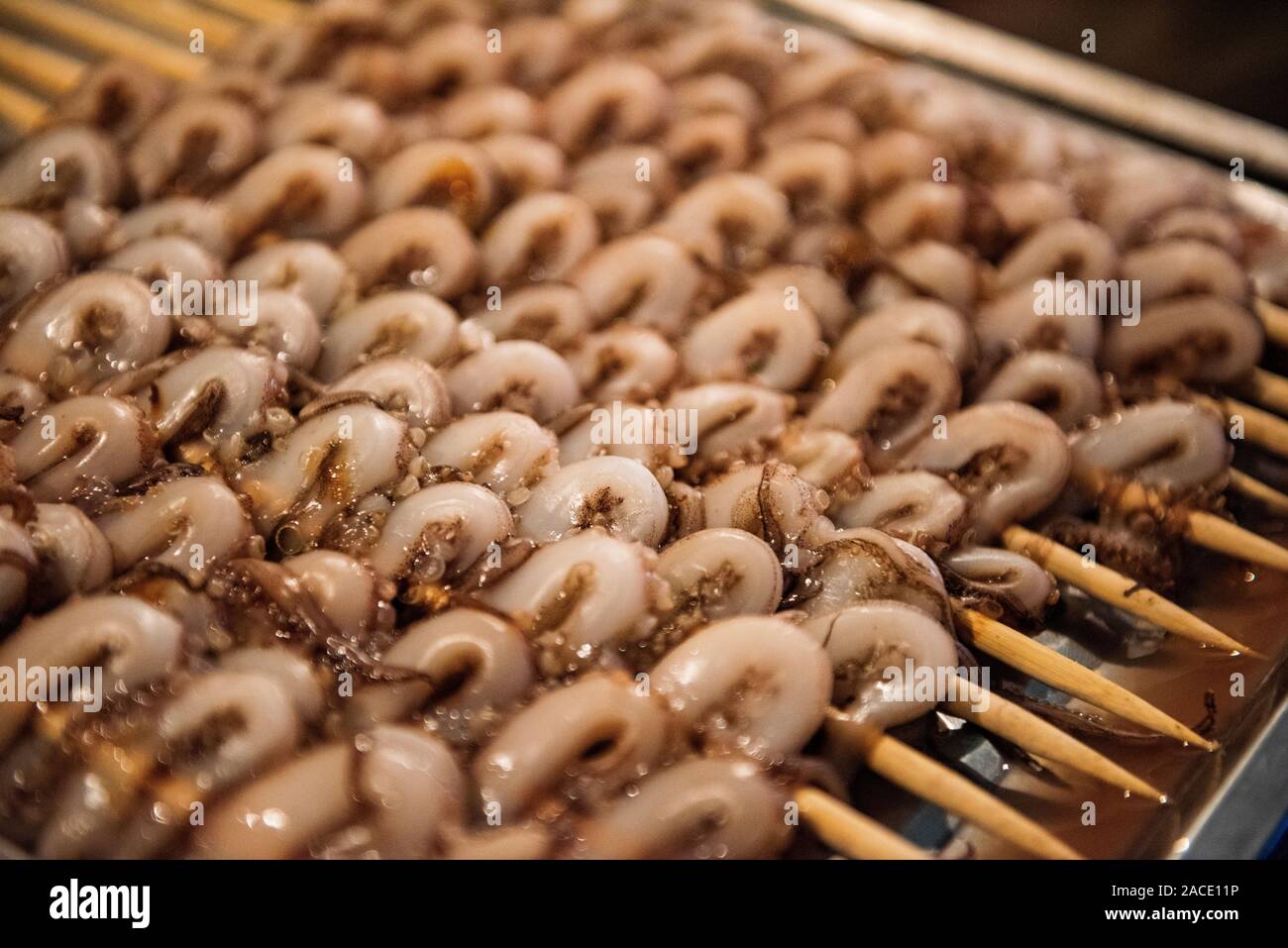 Fried and rosted octopus in a food market in Beijing, China Stock Photo ...