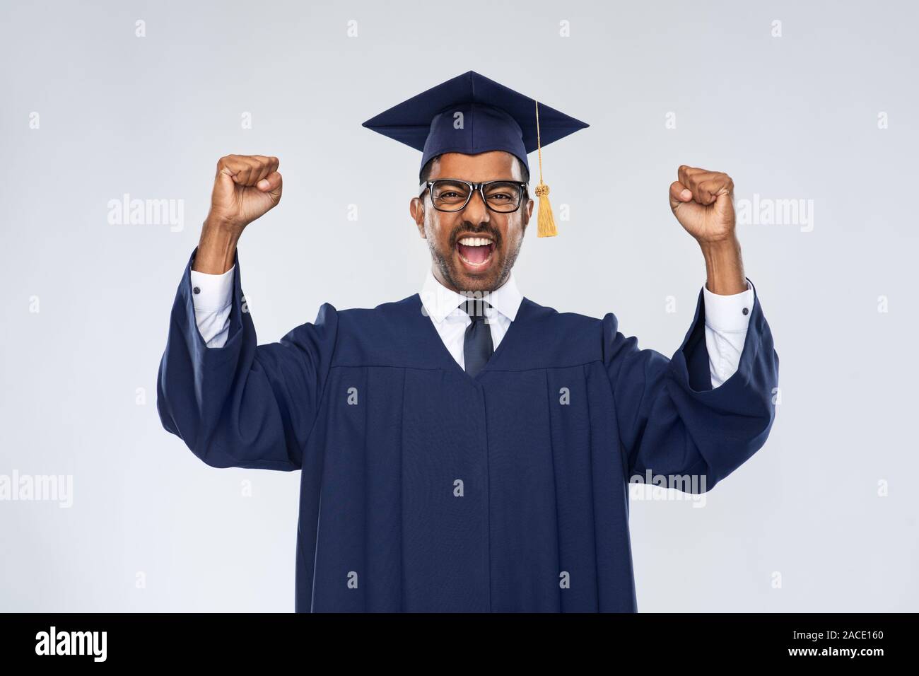happy indian graduate student celebrating success Stock Photo - Alamy