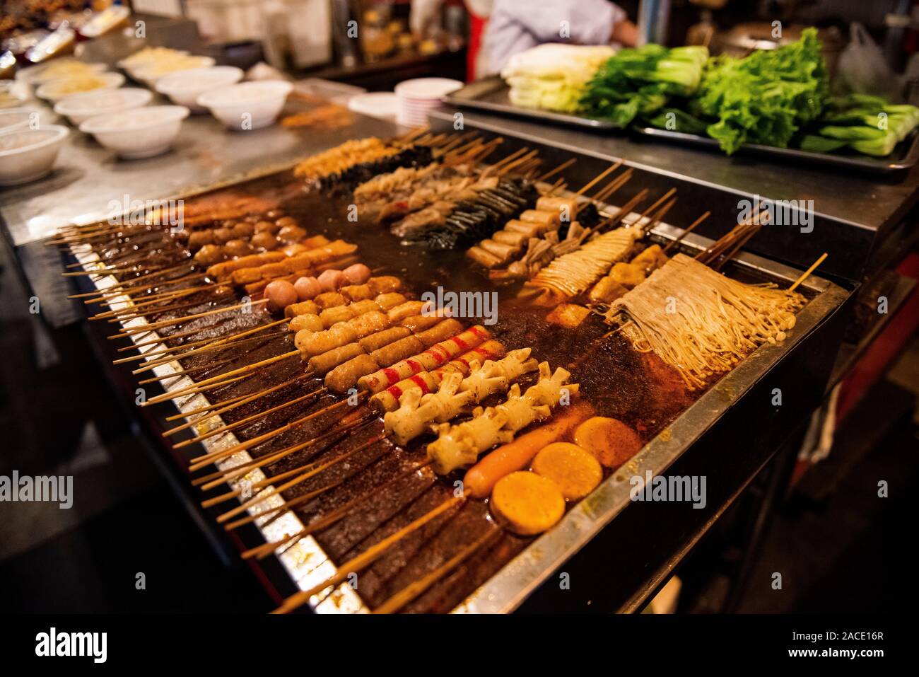 Street food in a market in Beijing, China Stock Photo - Alamy