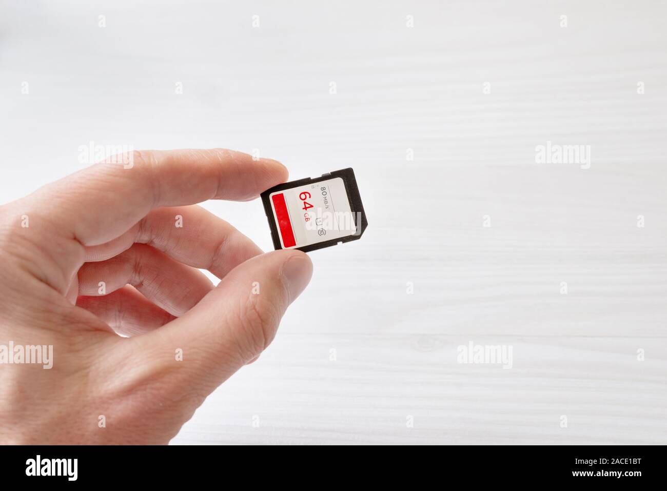 High capacity and performance sd memory card in hand close-up Stock ...