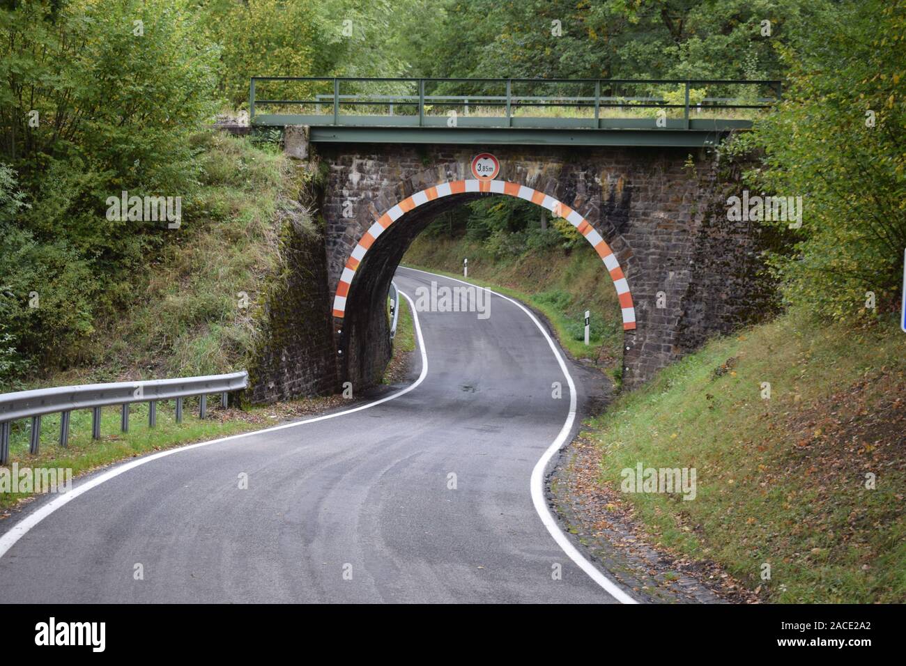 Narrow asphalt road across hi-res stock photography and images - Alamy