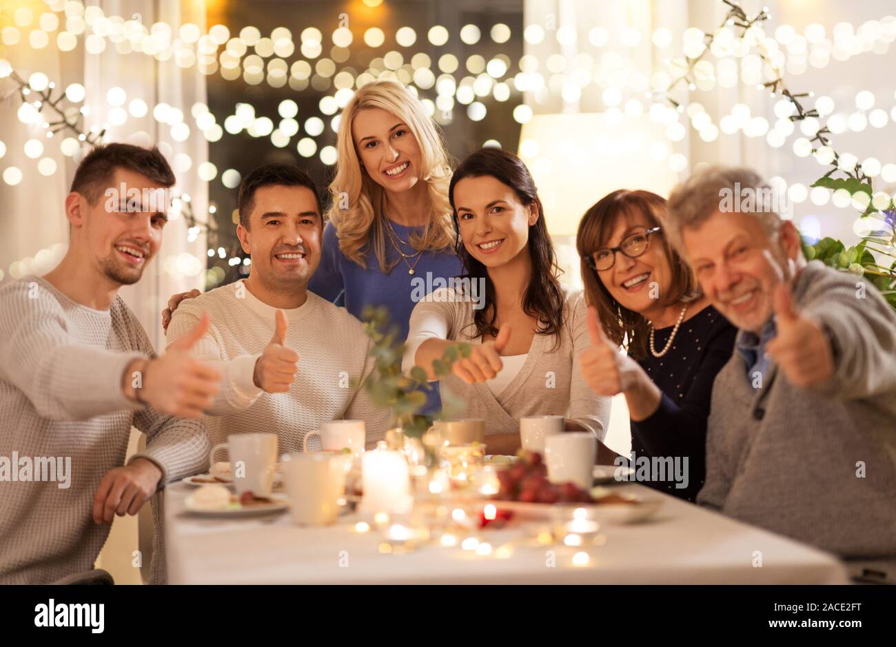 happy family having tea party at home Stock Photo - Alamy