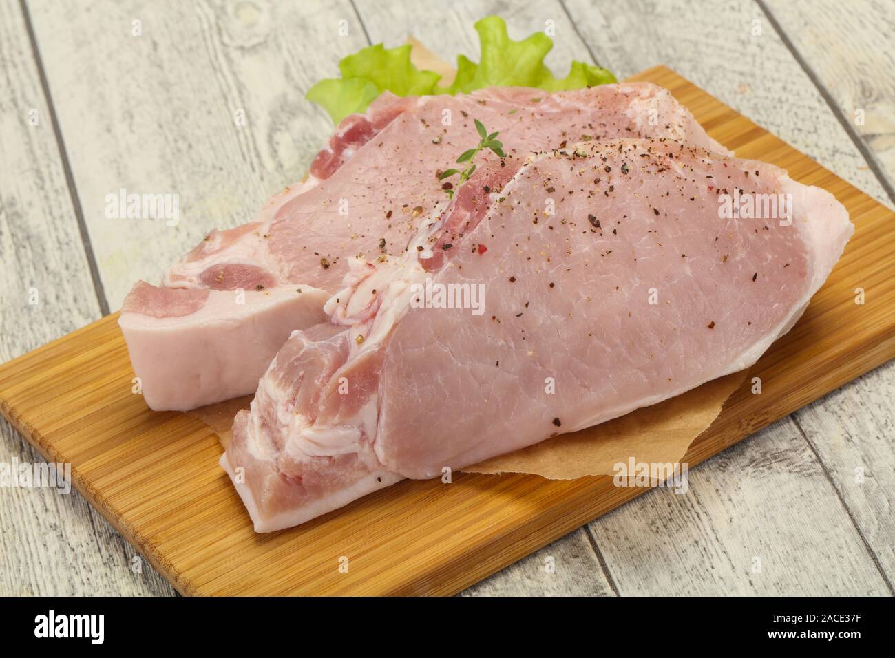 Raw pork meat steak ready for grill Stock Photo - Alamy