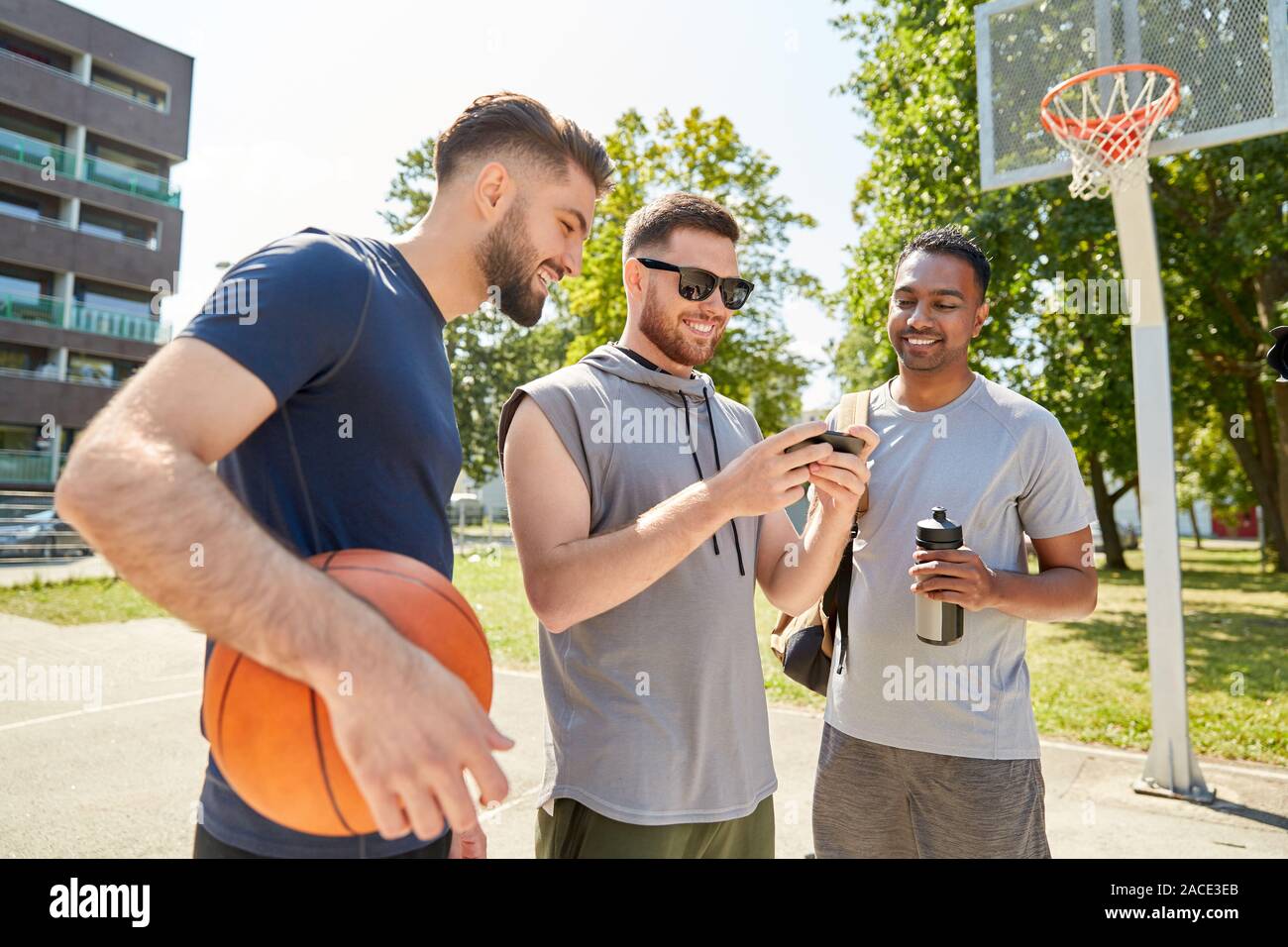 Young man on basketball playground hi-res stock photography and images ...