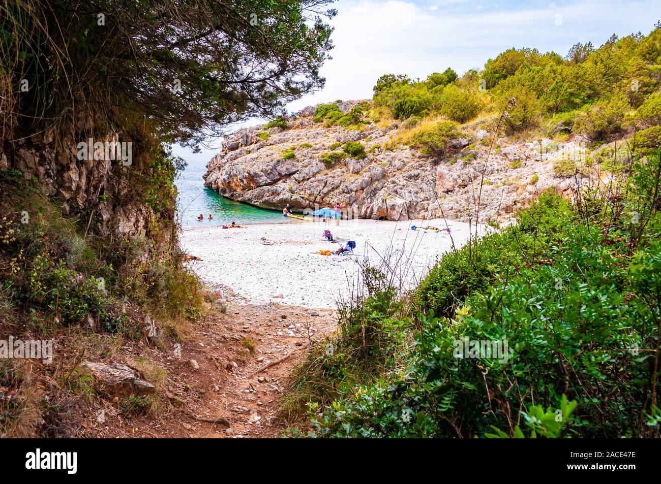 Cala Bianca, Italy - September 06, 2019: One of a couple secret ...