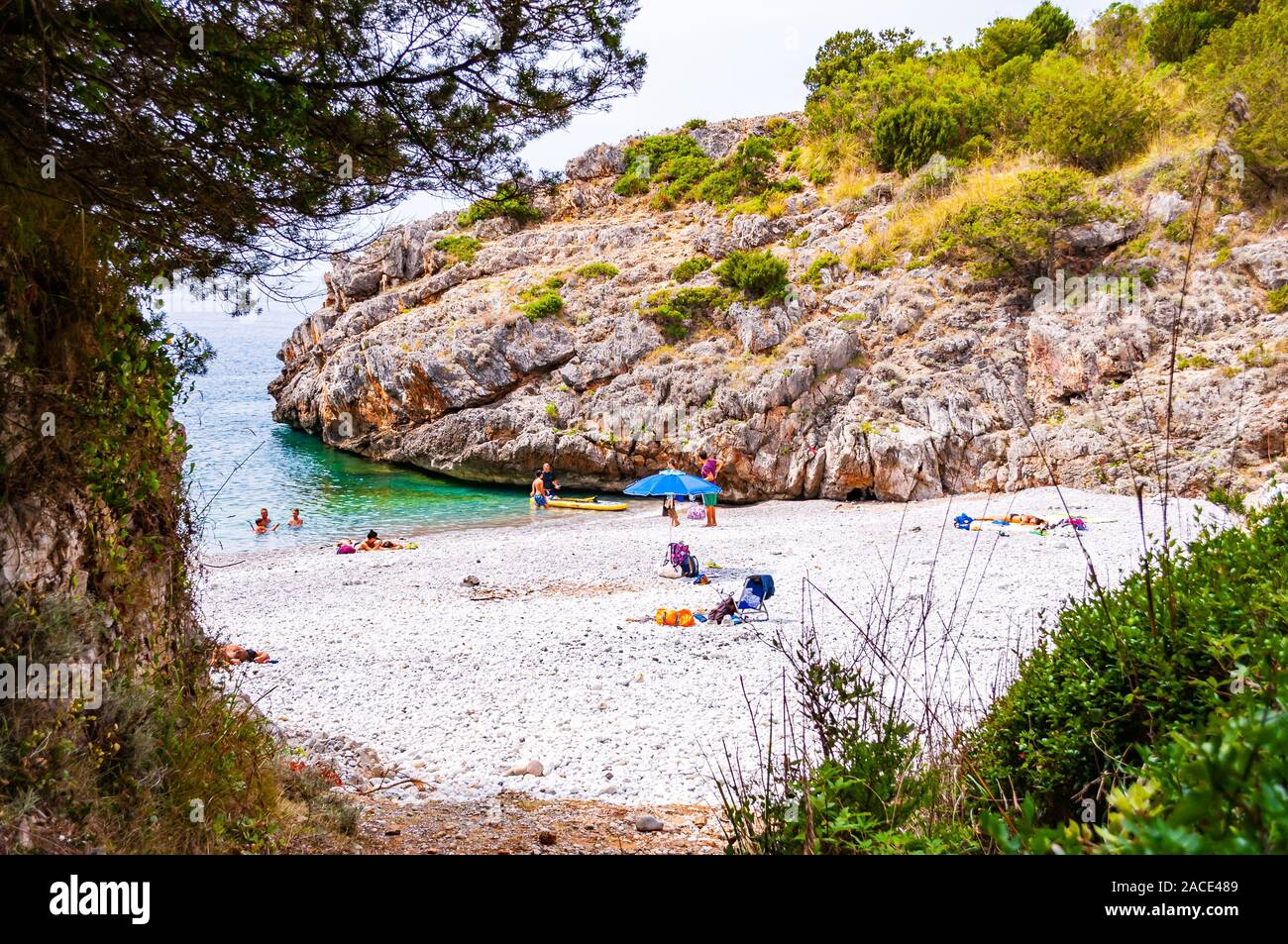 Cala Bianca, Italy - September 06, 2019: One of a couple secret ...