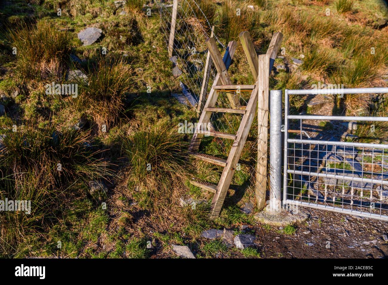 North wales ladder stile by five bar gate. Landscape Stock Photo - Alamy