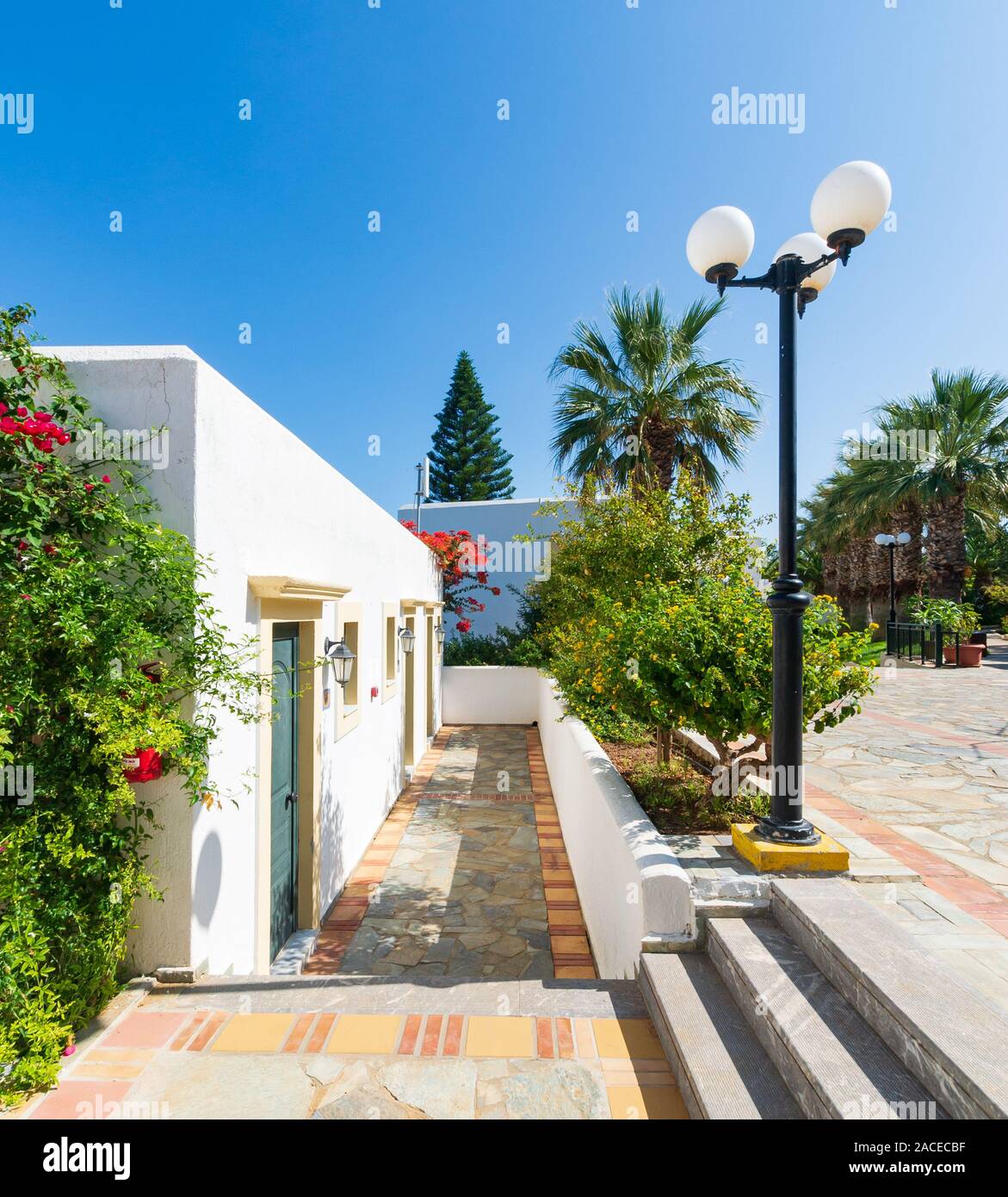Authentic narrow colorful mediterranean street in Cretan town Stock ...