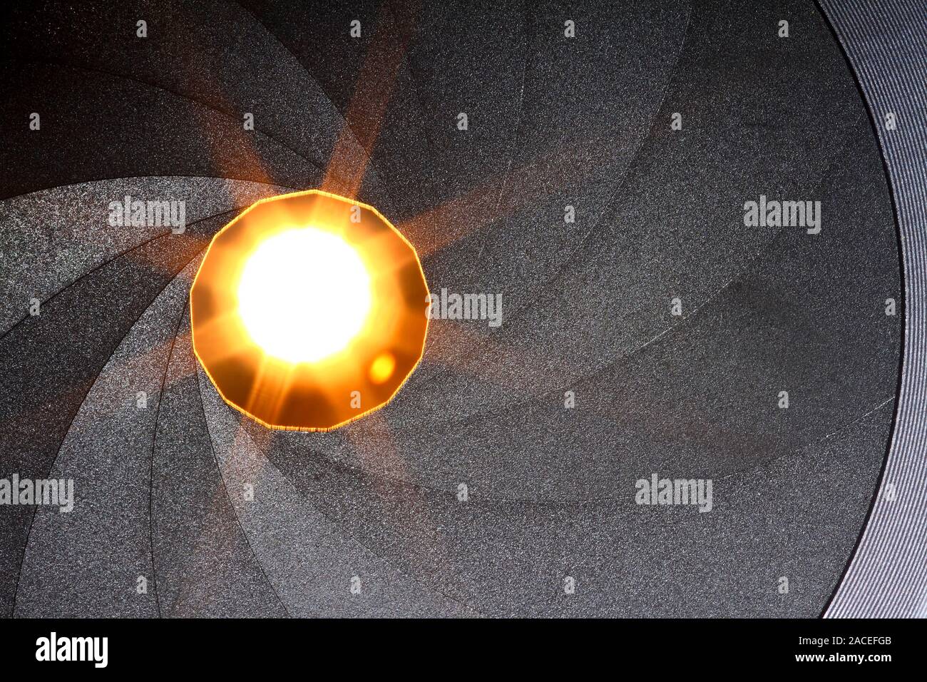 Macro view of the inside of a camera lens showing the aperture ...