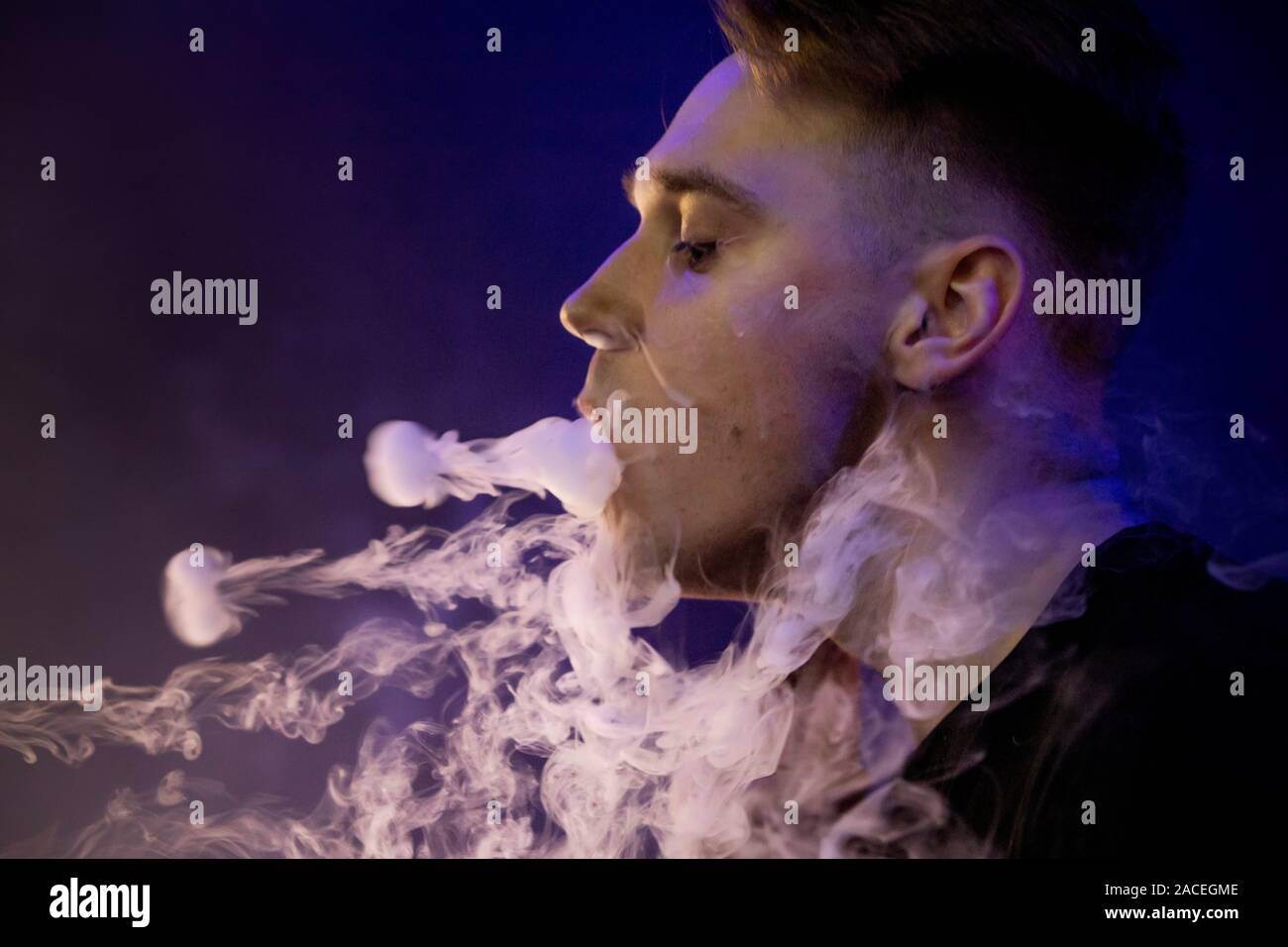 Moscow, Russia. 1st of December, 2019 A participant of Vape Tricks ...