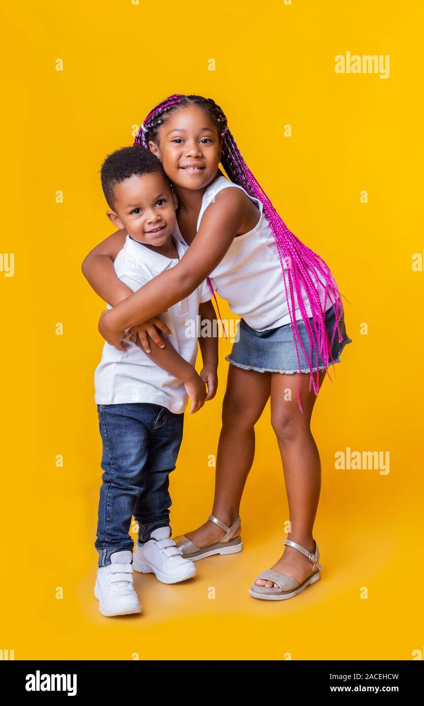 Cuddling children hi-res stock photography and images - Alamy