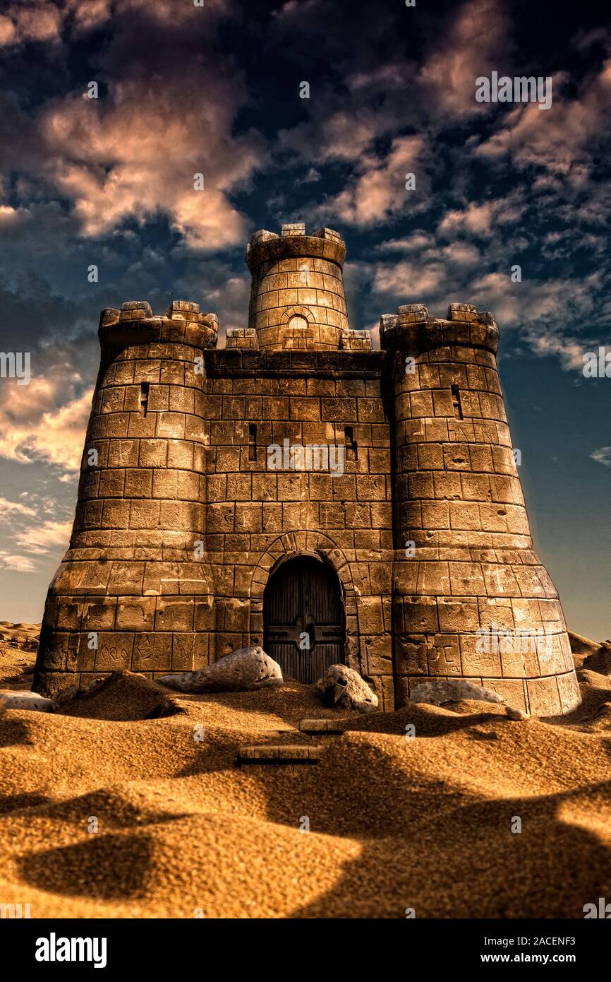 Derelict castle in the midst of desert sand dunes Stock Photo - Alamy