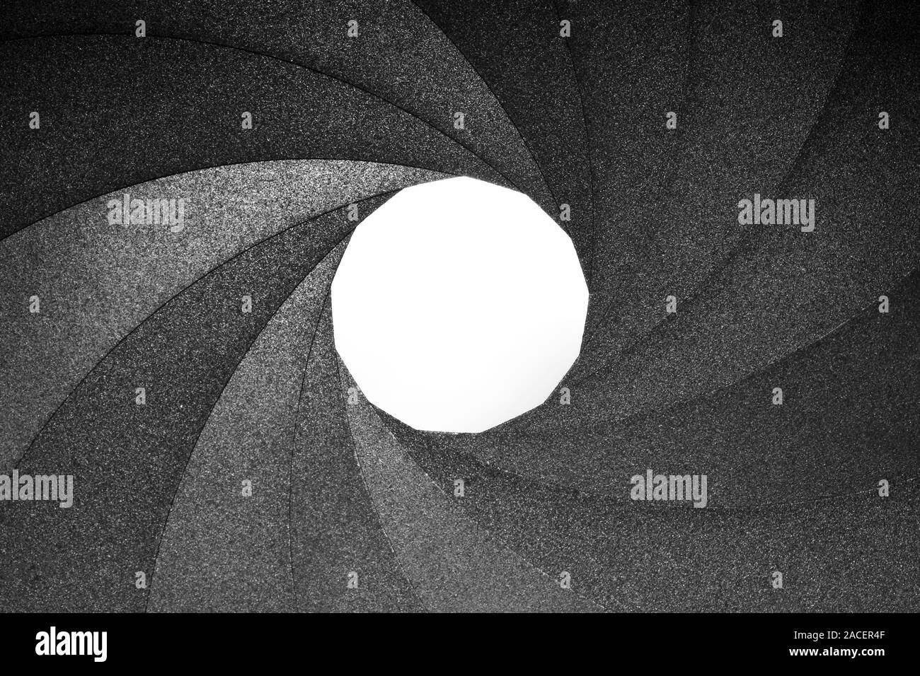 Macro view of the inside of a camera lens showing the aperture ...