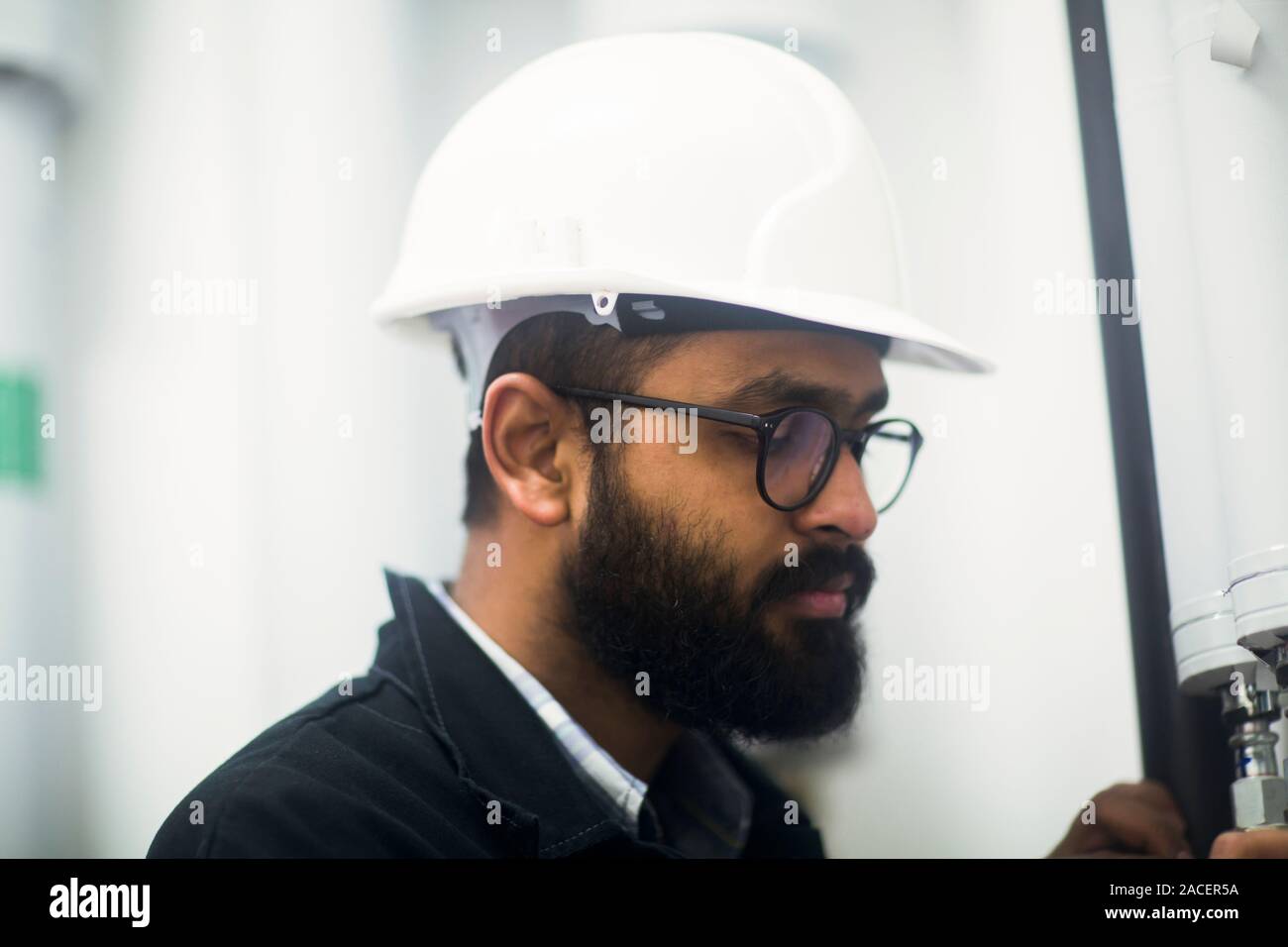 heating engineer checking system Stock Photo - Alamy