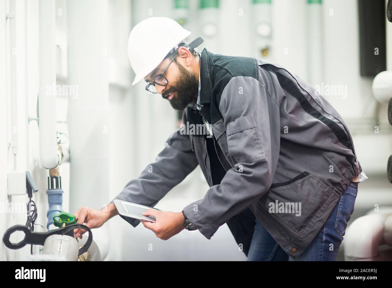 heating engineer checking system Stock Photo - Alamy